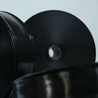 China Water Saving Lay Flat Irrigation Hose Double Layer Radius 2m-9m for sale