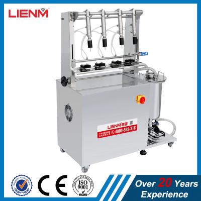 China Four Heads Semi automatic Small Scale Vacuum Perfume Filling Machine, small capacity perfume filler, low speed for sale