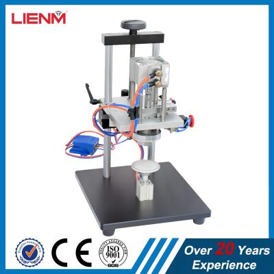 China perfume pump crimper machine/perfume cap grasping machine/perfume crimping machine for sale