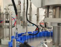 China Automatic perfume filling machine filling crimping collaring machine with pump and collar feeder for sale