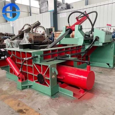 China 300*300mm Cuboid Bale Size Scrap Baling Machine Forward Out for sale