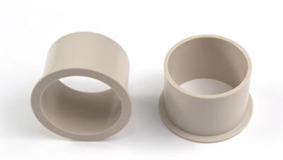 China Wear Resistant PEEK Injection Molding Bushing Natural Color Density 1.3 g/cm3 for sale