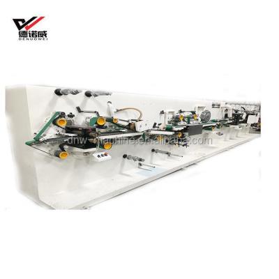 China CE Certified Sanitary Napkin Machine 700pcs/Min Production Line with 98% Pass Rate and Full Servo Drive System for sale