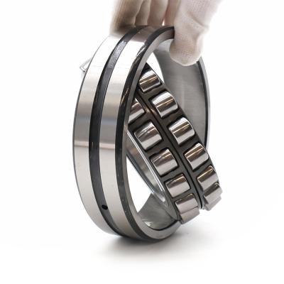 China 22215CC 22215 CC/W33 Double Row Chrome Steel Spherical Roller Bearing 75x130x31 mm for sale