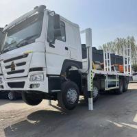 China Customized 8x4 Flatbed Diesel Truck for Transporting Construction Machinery Loaders Excavators for sale