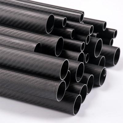 China Twill Woven Finish Round 3K Carbon Fiber Tube High Strength Roll Wrapped for sale