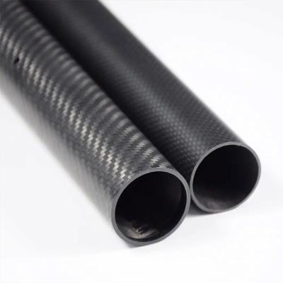 China Carbon Fiber Tube 25mm x 23mm x 500mm 3K Roll Wrapped 100% Carbon Fiber Tube Glossy Surface for sale