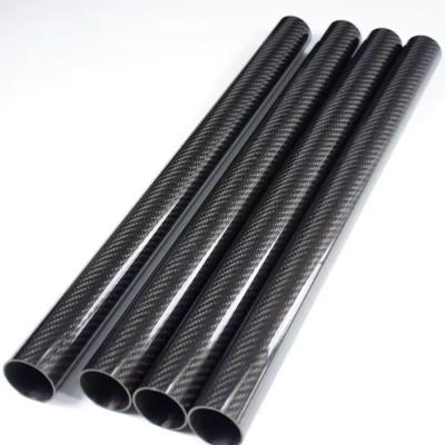 China 35mm O.D. 33mm I.D. 35x33x500mm 35mm 3K Roll Wrapped 100% Pure Round Carbon Fiber Tubes for sale