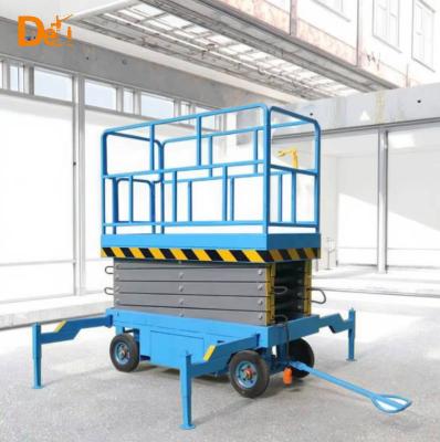 China Mobile Electric Scissor Lift Hydraulic Automatic Scaffolding Elevator For Building for sale