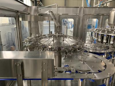 China Auto Rotary Beverage Filling Machine 10000-12000BPH PET Bottle 3-in-1 Stainless Steel for sale