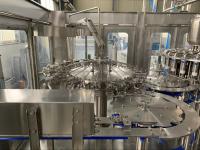 China Industrial 0.3-2L PET Bottle Filling Machine 10000-12000 BPH 3-in-1 for Juice for sale