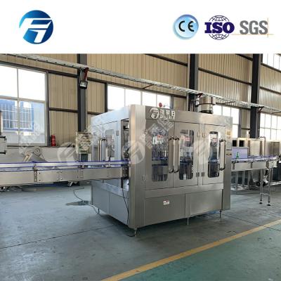 China Glass Bottle Carbonated Water Filling Machine 2000-2500 BPH 3-in-1 Rinsing Filling Capping for sale