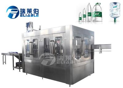 China Rotary Three In One 1 Liter Water Bottle Filling Machine for sale