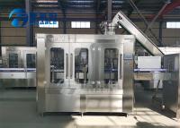 China Rotary Type 6000bph SUS304 Glass Bottle Filling Machine for sale