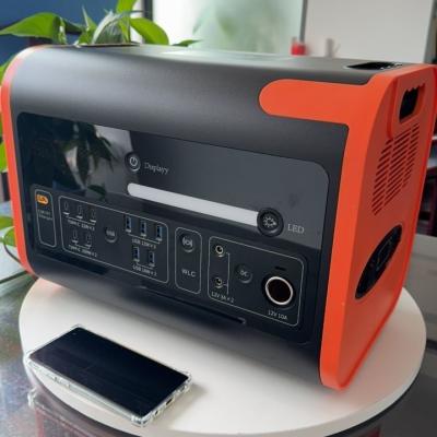 China 800W Solar Charging Portable Energy Storage Power Station in Black with Orange Color for sale