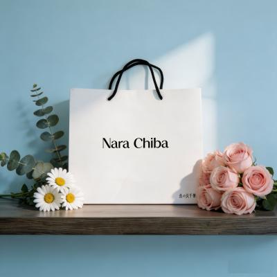 China Custom Kraft Paper Bag Printed FSC Certified Recyclable Shopping Carrier for Boutique Retail, Daily Merchandise for sale