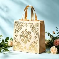 China Gold Royal Shopping Paper Hand Bag Satin Handle Wide Opening Design for School, Travel, Shopping Mall for sale