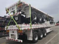 China Heavy-Duty Fatbed Semi Trailer for sale in Africa: Designed for Stable and Efficient Transportation of Oversized Loads for sale