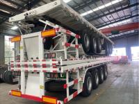 China CIMC cheap 3 axles high Steel Cargo Hot Sale 20ft 40ft Container Chassis with lock Low Flat Deck transport Flatbed Semi Trailer for sale