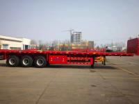 China CIMC 3 axles 40ft 12500*2500*1500mm 70 ton capacity 8-12 sets twist lock Flatbed deck truck tractor Semi Trailer for sale
