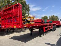 China CIMC cheap 2/3/4 axles Steel Cargo Hot Sale 20ft 40ft Container Chassis with lock Low Flat Deck transport Flatbed Semi Trailer for sale