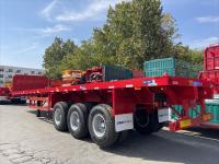 China CIMC cheap 2/3/4 axles Steel Cargo Hot Sale 20ft 40ft Container Chassis with lock Low Flat Deck transport Flatbed Semi Trailer for sale