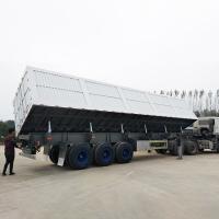 China CIMC Tri axle Side Tipper 70 Tons allows goods to be unloaded from the side transporting building materials dump semi trailer for sale