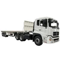 China CIMC steel iron lowest price iron 315/80r22.5 50t 13 M 3 Axis Heavy duty versatile Flatbed Truck Semi Trailer for sale