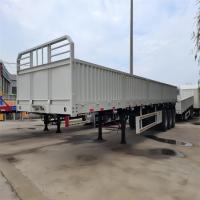 China CIMC 40FT 3 Axle tare weight 8.5t 12.4*2.48m payload 45T heavy duty mechanical suspension 13pc leaf spring Wall Side SemiTrailer for sale