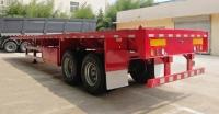 China CIMC 3 axle flatbed semi trailer steel container skeleton truck trailer durability used for transporting construction machinery for sale