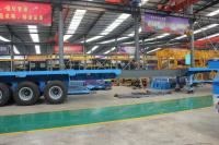 China High Quality 4-Axle Flatbed Shipping Container Semi Trailer with Nice Twistlocks Utility Steel Truck Trailers for sale