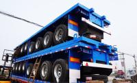 China High Quality 4-Axle Flatbed Shipping Container Semi Trailer with Nice Twistlocks Utility Steel Truck Trailers for sale