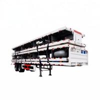 China 2 Axle 20ft 40ft Semi Trailer Shipping Container Twistlocks Flatbed Design Carbon Steel 12R22.5 Truck Trailers for sale