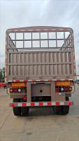 China CIMC iron material 3 axles 40-80 Tons Capacity Stake Type Heavy cargo van type High Fence Warehouse Semi truck trailer for sale