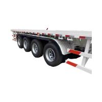China Customizable 4-Axle Flatbed Semi-Trailer Durable Steel Construction Truck Trailers for sale