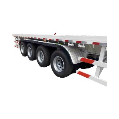 China Customizable 4-Axle Flatbed Semi-Trailer Durable Steel Construction Truck Trailers for sale