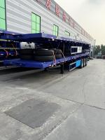 China Transport Container Flatbed Semi-trailer 4-axle 100 Ton Flatbed Truck Trailer Wholesale Customization for sale