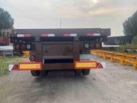 China China's New 40 50 Foot Flatbed Container Transport Truck Trailer 4-axle Flatbed Semi-trailer for sale