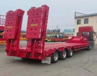 China Steel Or Aluminum Tri-axle 40/45/50/60 Tons Heavy-duty Transport Vehicle Low Flatbed Semi Trailer for sale