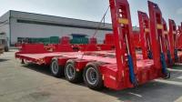 China Steel Or Aluminum Tri-axle 40/45/50/60 Tons Heavy-duty Transport Vehicle Low Flatbed Semi Trailer for sale
