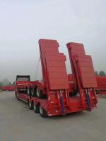 China Steel Or Aluminum Tri-axle 40/45/50/60 Tons Heavy-duty Transport Vehicle Low Flatbed Semi Trailer for sale
