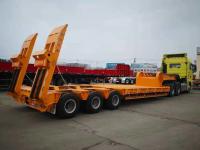 China Steel Or Aluminum Tri-axle 40/45/50/60 Tons Heavy-duty Transport Vehicle Low Flatbed Semi Trailer for sale