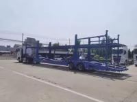 China Double Interconnect Steel Chassis Deck With Mechanical Suspension 13 To 18T Axles Transporter Car Semi Trailer for sale