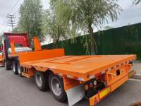 China Double Axles Iron Texture Length From 10m To 20m Heavy Duty Low Flatbed Transport Truck Semi Trailer for sale