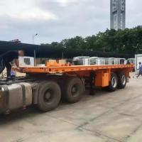China Double Axles Iron Texture Length From 10m To 20m Heavy Duty Low Flatbed Transport Truck Semi Trailer for sale