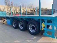 China Heavy-Duty Fatbed Semi Trailer For Sale In Africa: Designed For Stable And Efficient Transportation Of Oversized Loads for sale