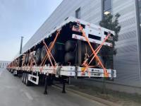 China 40ft 45ft Flat Bed Trailer Another Fuel tank  Installed on the Container Flatbed Trailer Bulk Goods Transport Trailer for sale