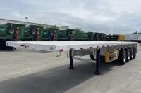 China 12 Set Twist Lock Flatbed Semi Trailer For 30T To 100ton Capacity And Truck Trailer for sale