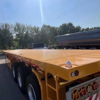 China 20ft 40ft Container Flatbed Truck Semi Trailer with 3mm 4mm Grain Plate Platform for sale