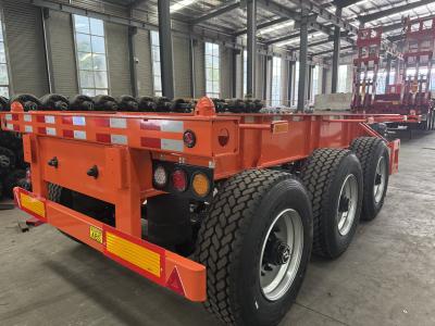 China Large Single Tires With Air Suspension 3 Axles 20ft 40ft 45ft Container Transport Steel Skeleton Semi Trailer for sale